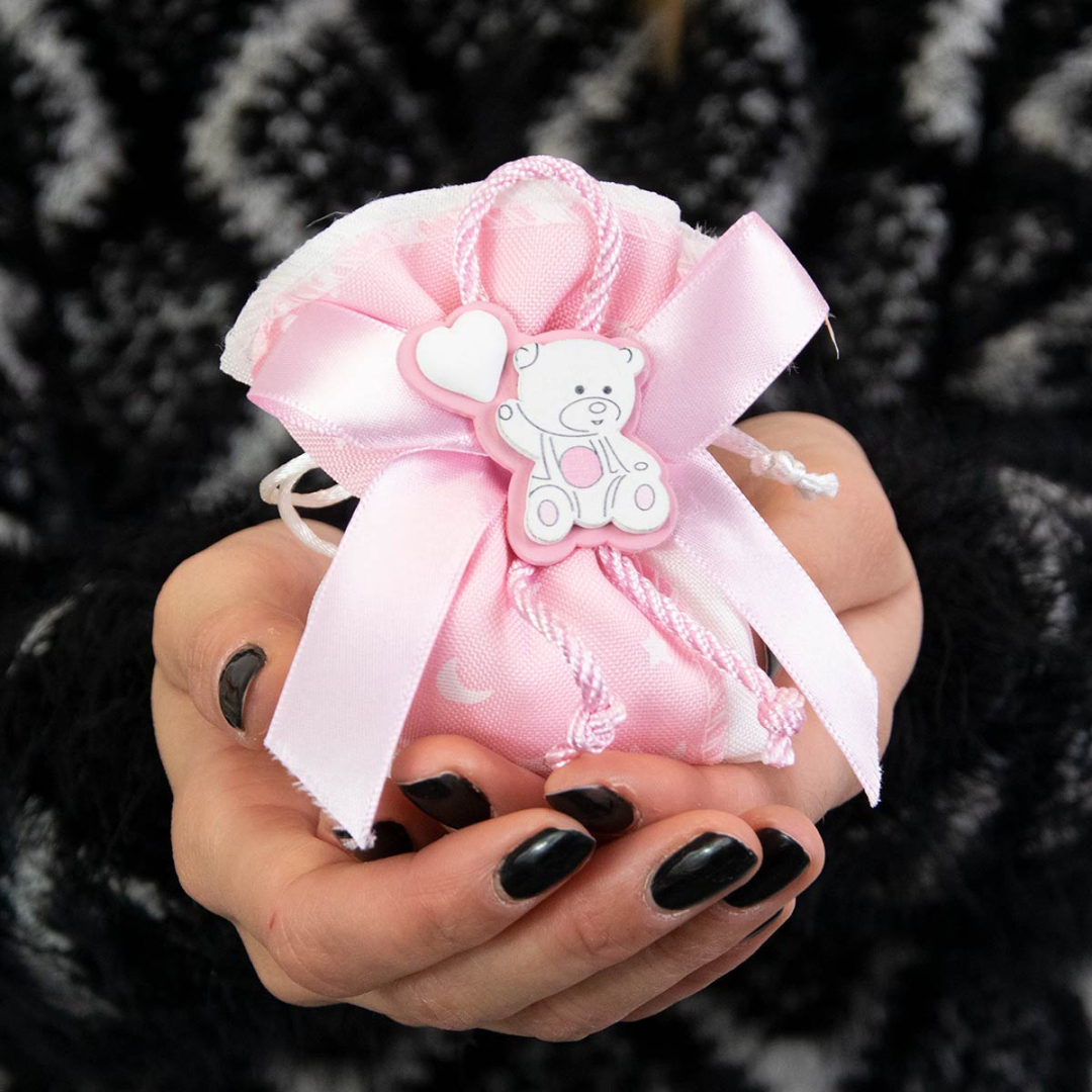 Sacchettini portaconfetti rosa con orsetto in legno su